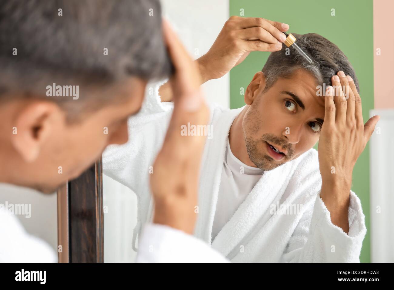 Man using hair dye hi-res stock photography and images - Alamy