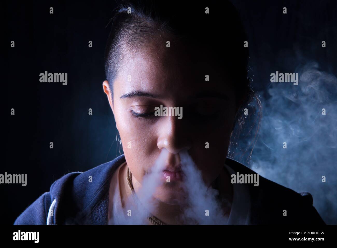 Woman Nose Smoke High Resolution Stock Photography and Images - Alamy