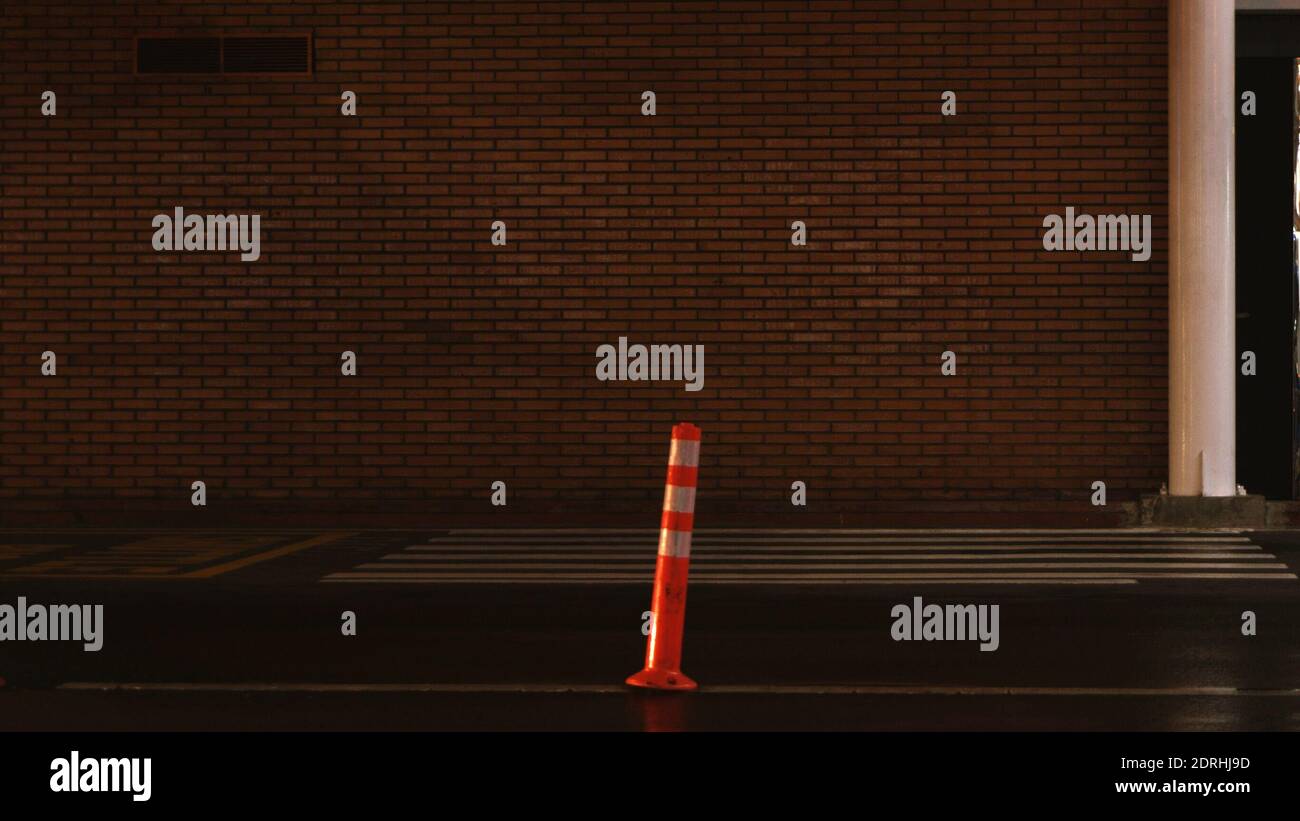Traffic cone and brick wall hi-res stock photography and images - Alamy