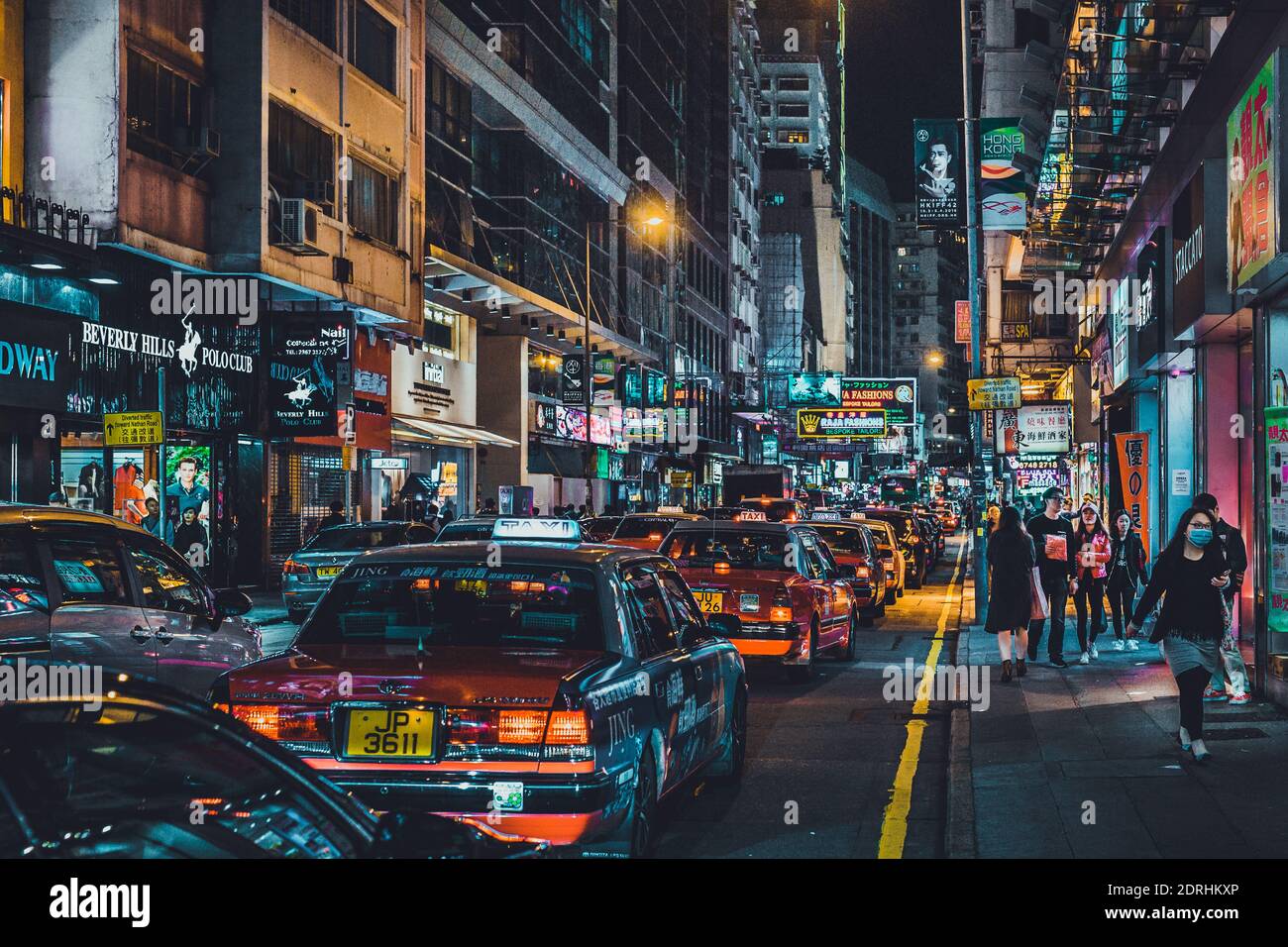 Traffic On City Street At Night Stock Photo - Alamy