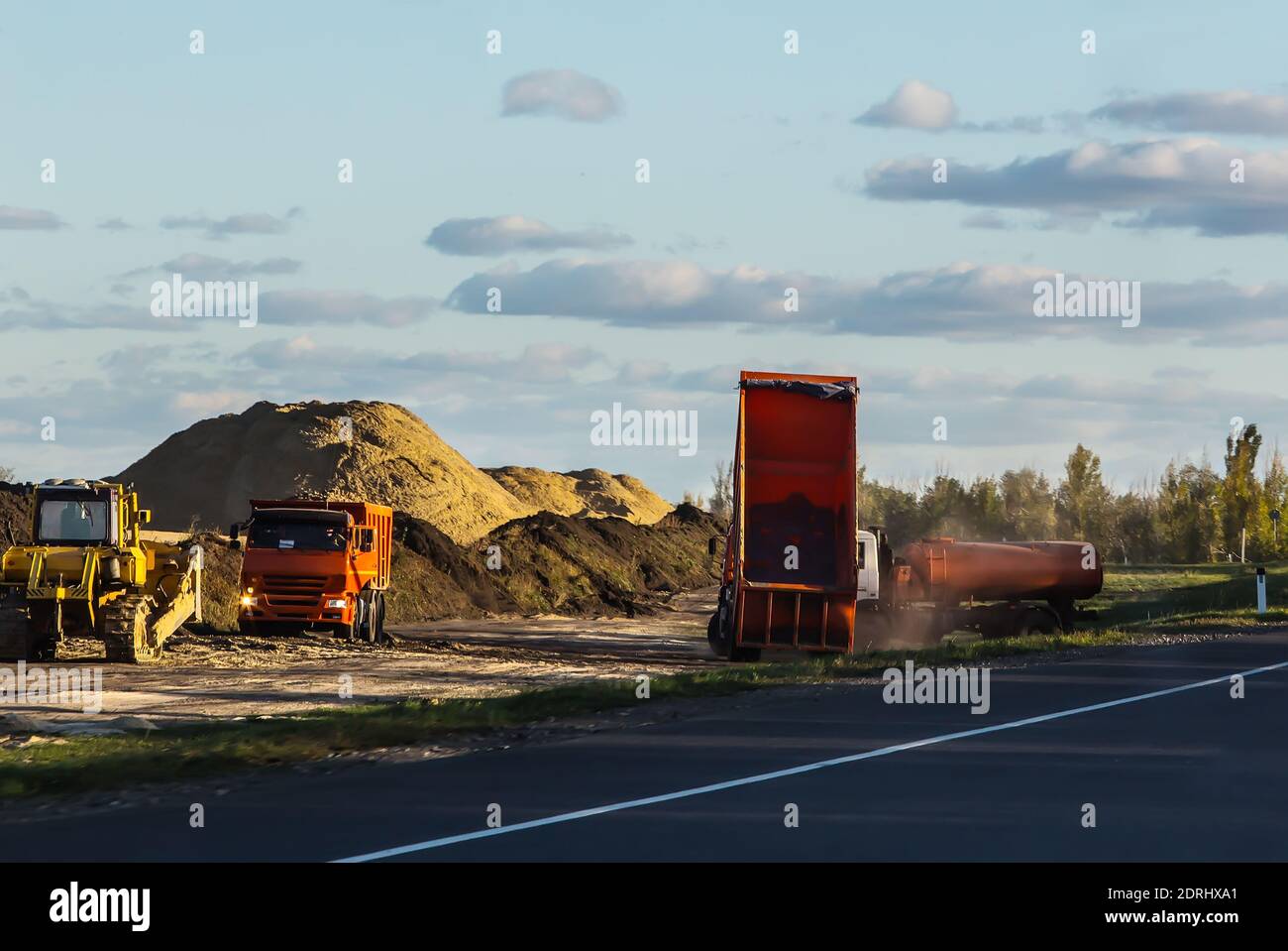road machinery and vehicles in the construction of the road Stock Photo ...