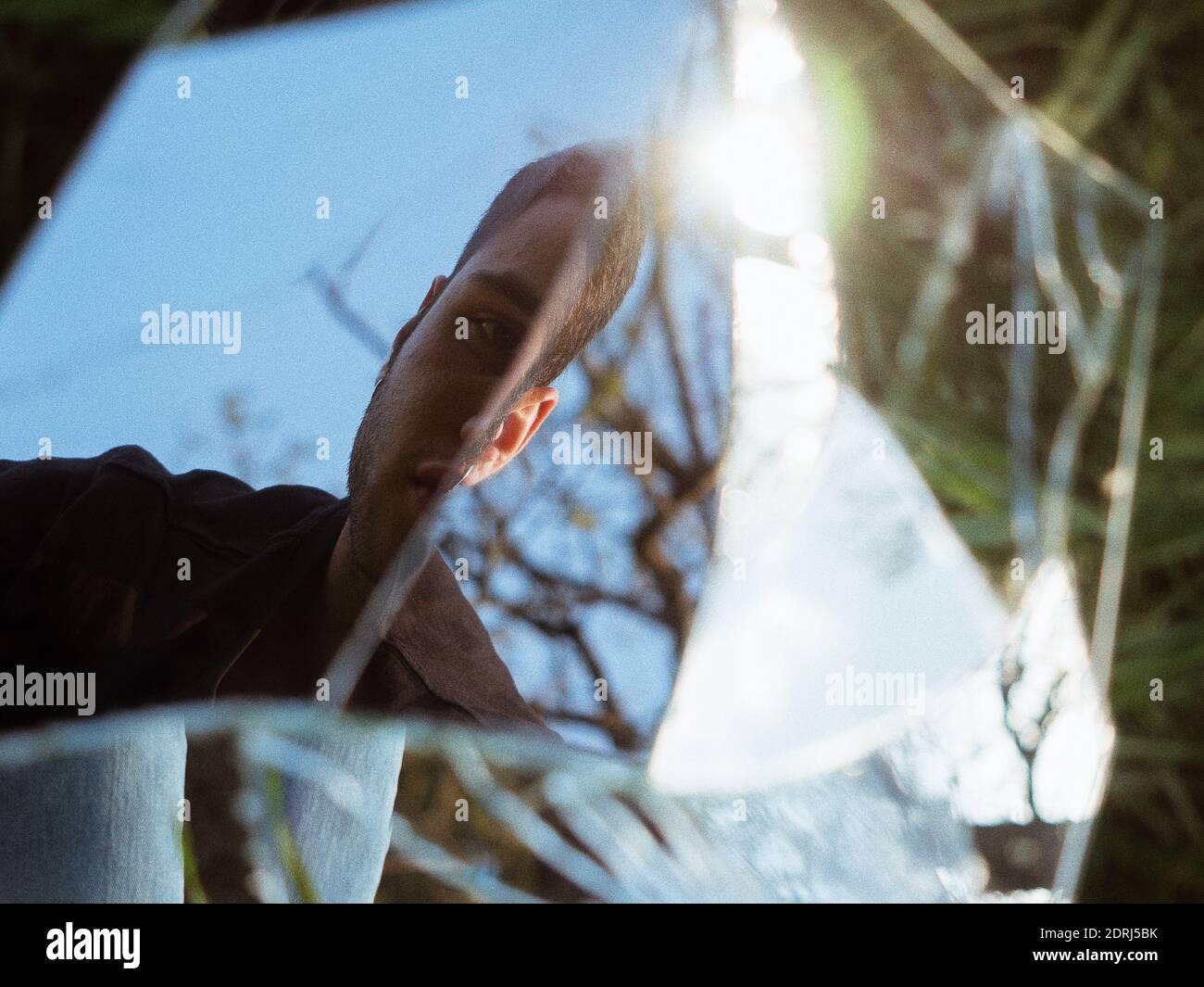 Reflection on cracked mirror hi-res stock photography and images - Alamy