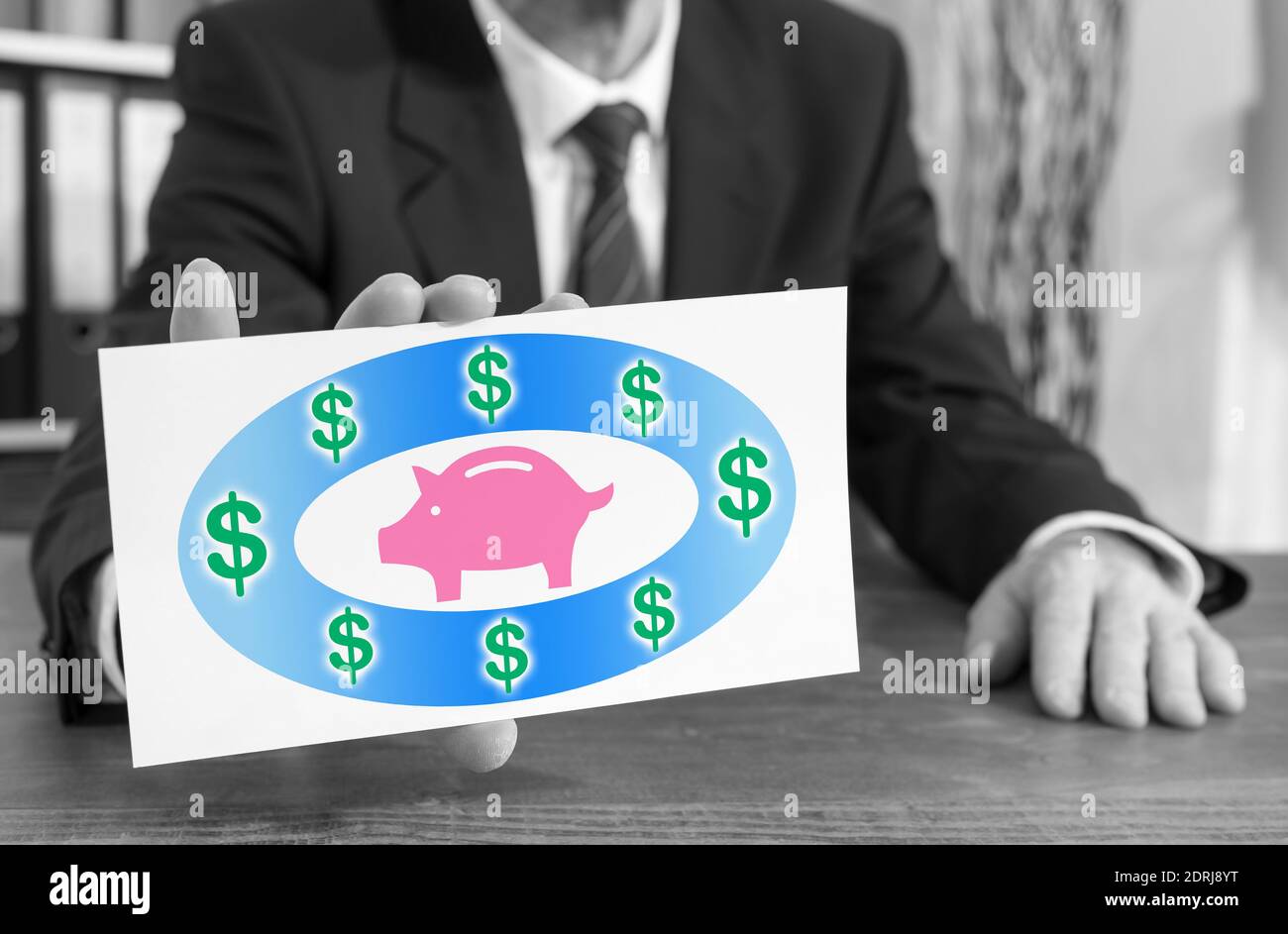 Businessman showing an index card with saving money concept Stock Photo ...