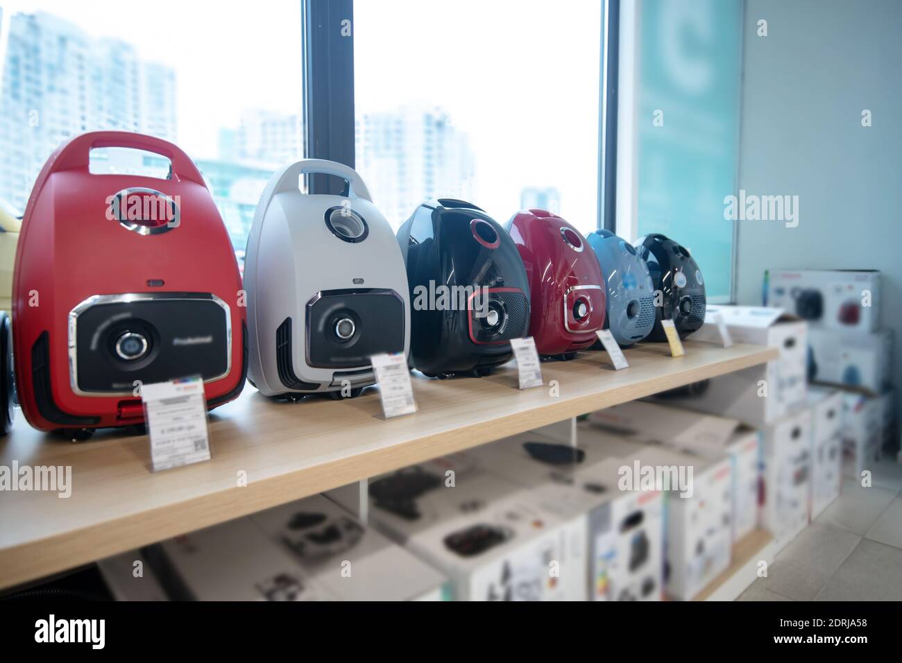 Picture of different vacuum-cleaners in a big showroom Stock Photo - Alamy