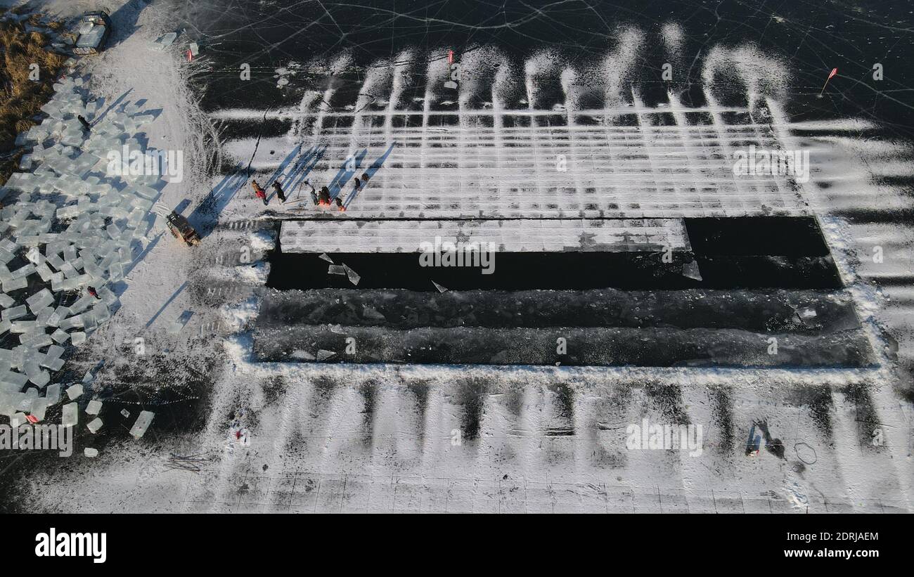 More than a dozen mining icemen work hard to harvest ice cubes in ...