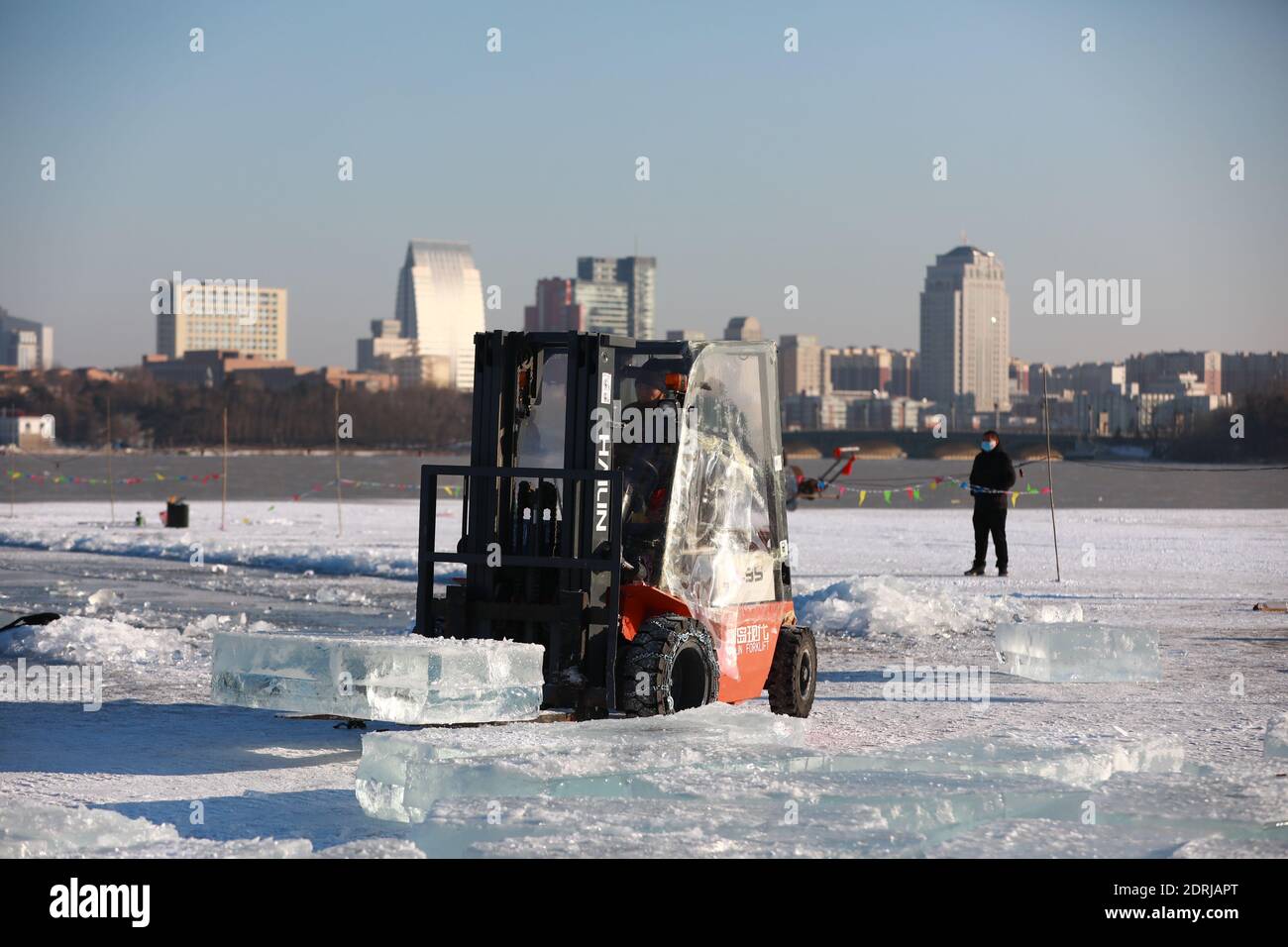 More than a dozen mining icemen work hard to harvest ice cubes in ...