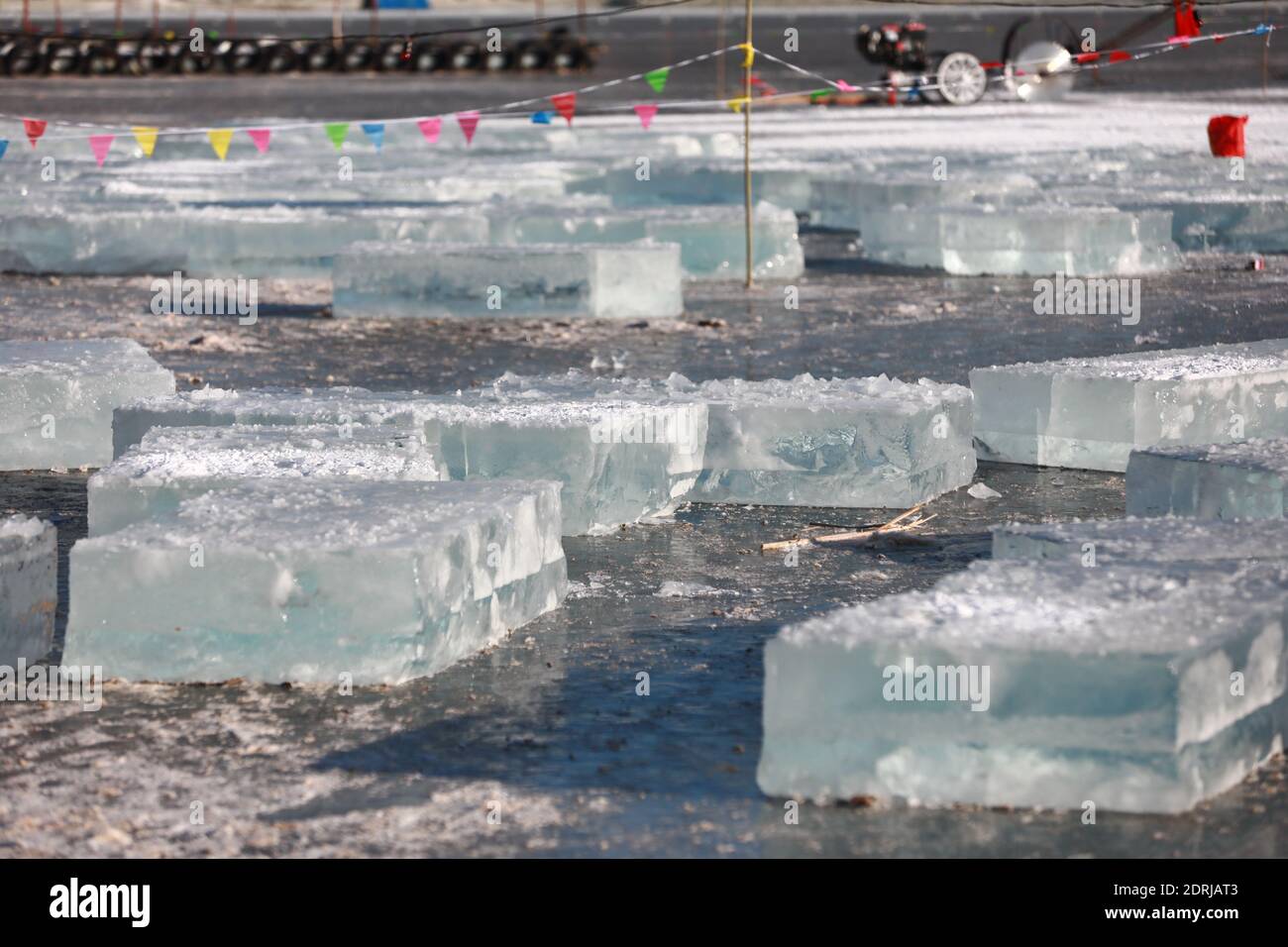 More than a dozen mining icemen work hard to harvest ice cubes in ...