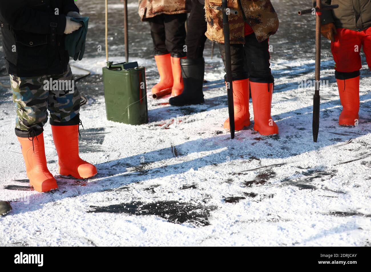 More than a dozen mining icemen work hard to harvest ice cubes in ...