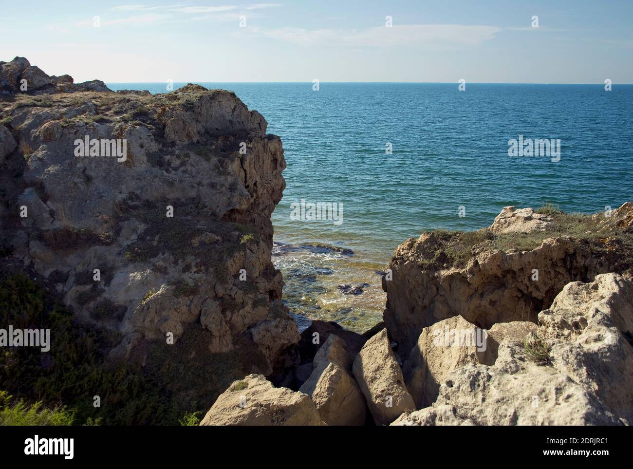 Huge stones among the rocks by the sea Stock Photo - Alamy