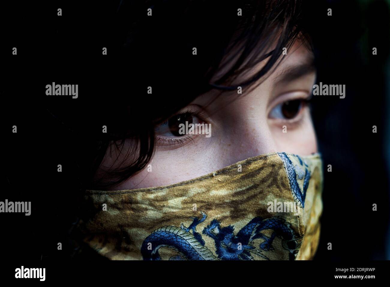 Boy wearing face mask, Barcelona, Spain Stock Photo - Alamy