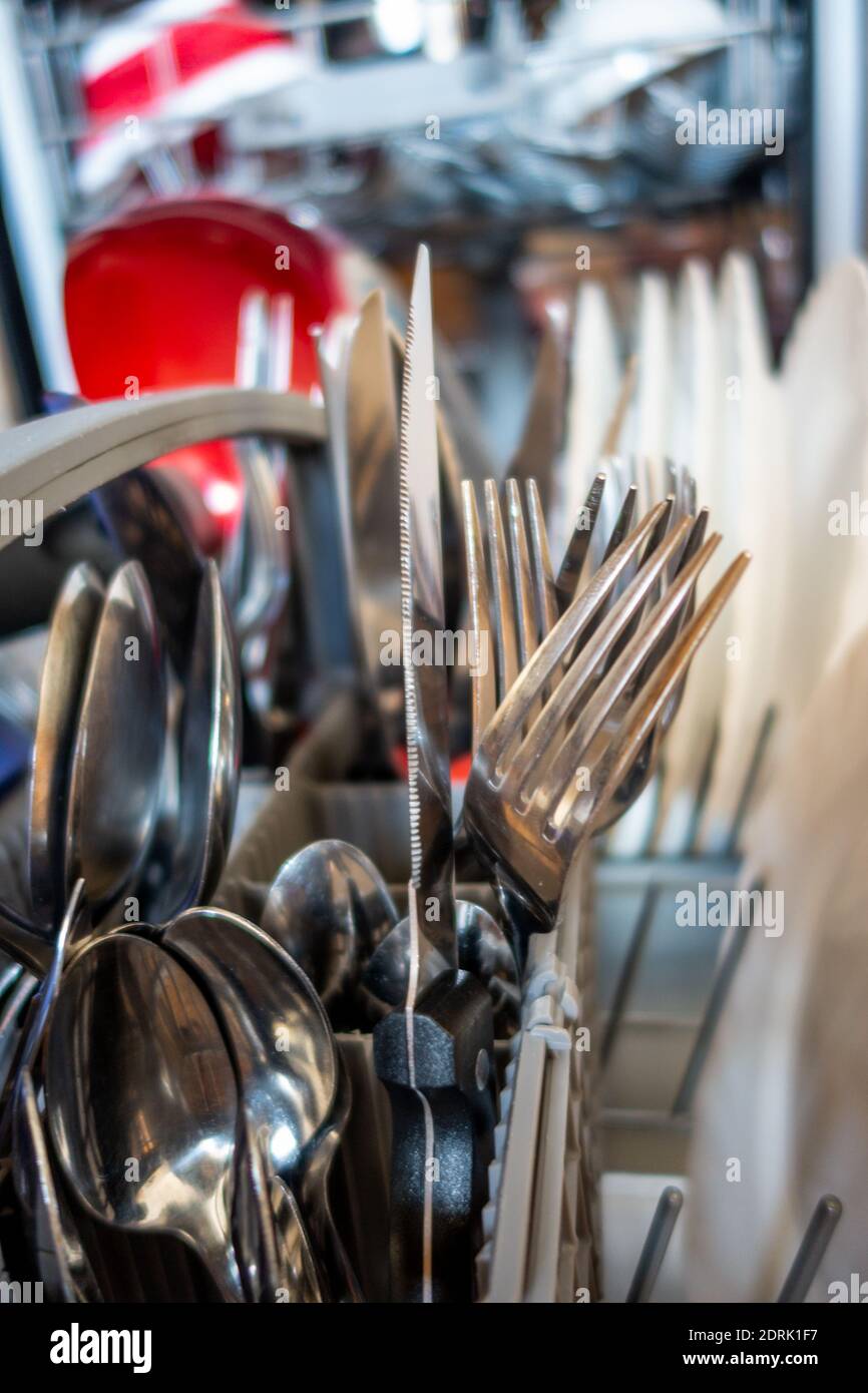 Open dishwasher in a kitchen. Closeup view Stock Photo - Alamy
