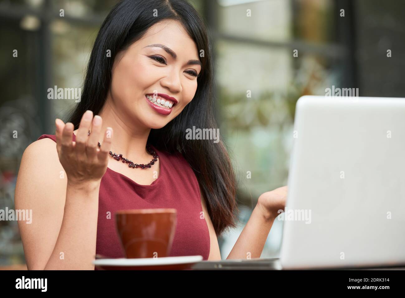 Attractive young business women calling by cellular phone isolated on ...