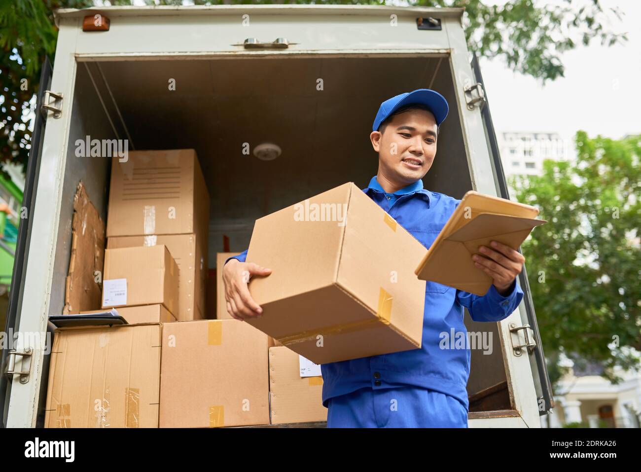 Man delivering mail Stock Photo - Alamy