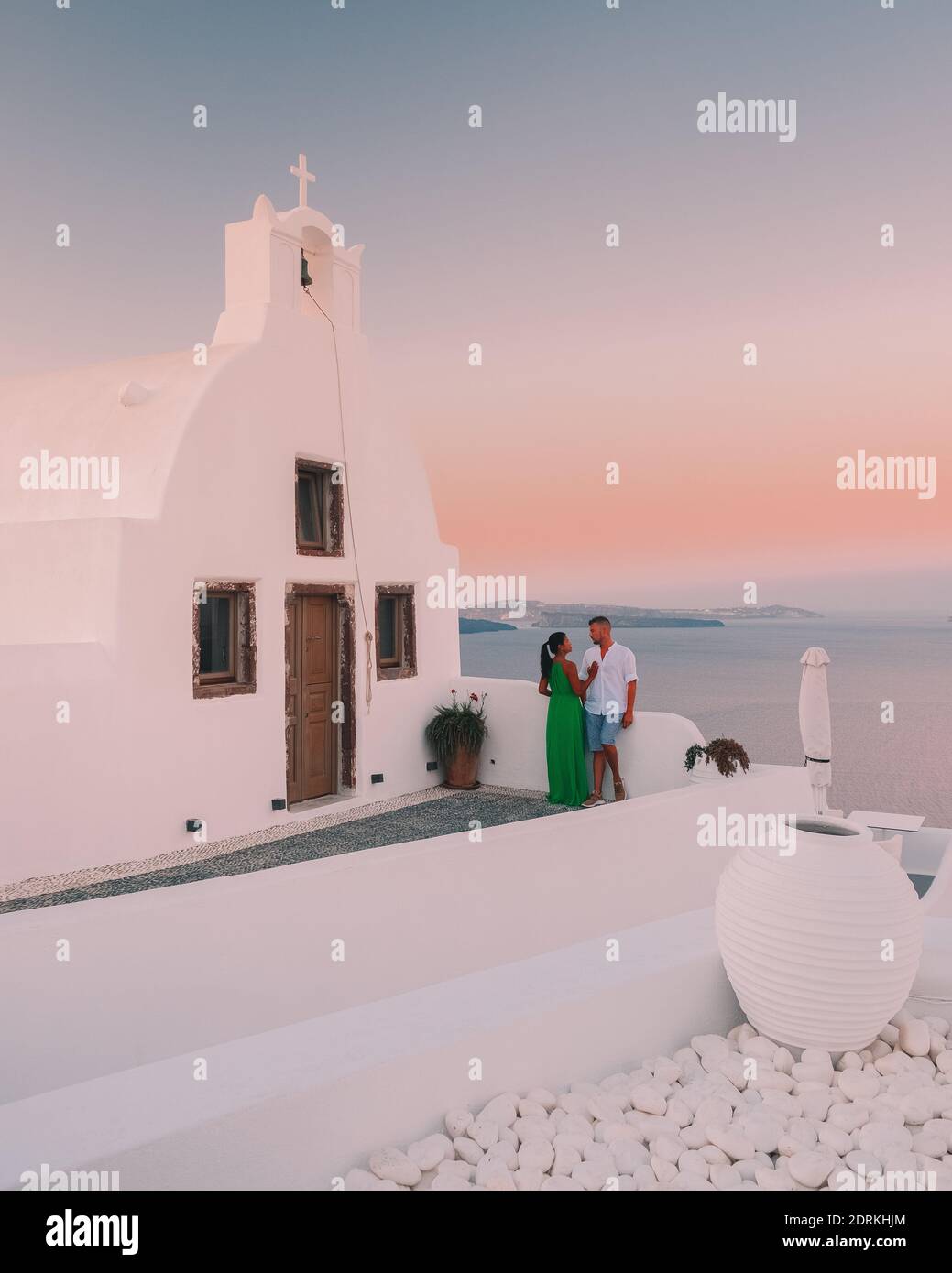 Santorini Island Greece, couple men and woman on vacation at the Greek ...