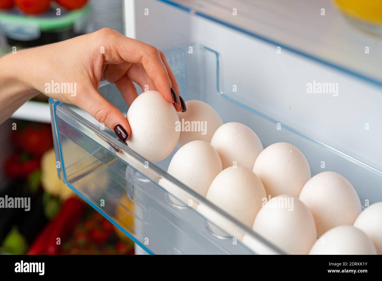 Hand taking egg hi-res stock photography and images - Alamy