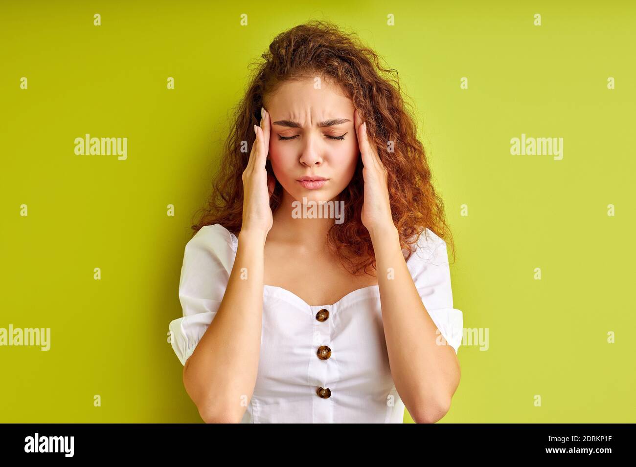 head of girl is bursting with thoughts, isolated over green background ...