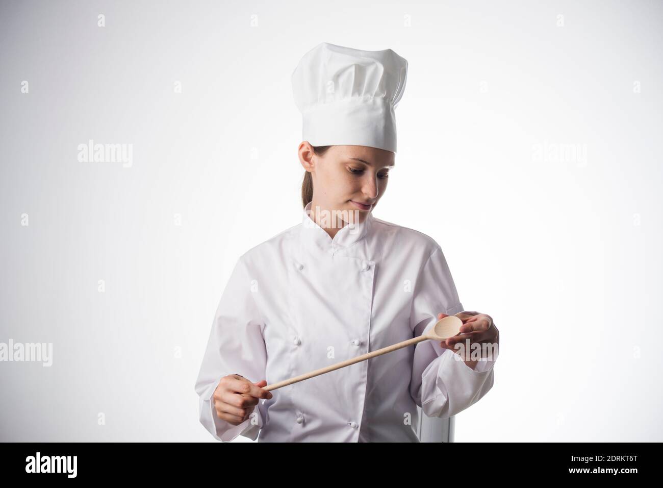 Chef woman. Isolated over white background Stock Photo - Alamy