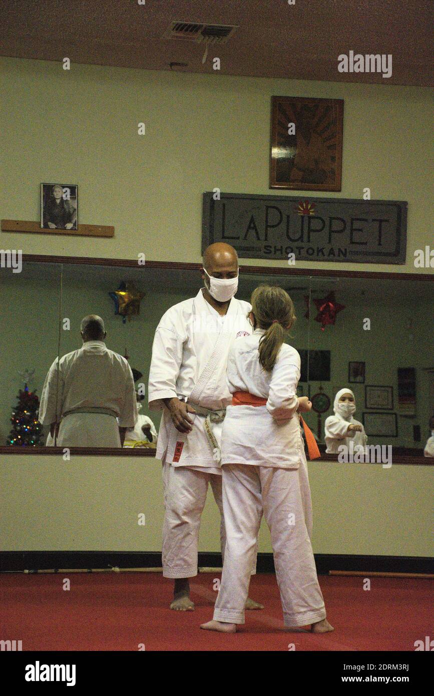 This action photo is of my daughter in her Karate class. Karate is a ...