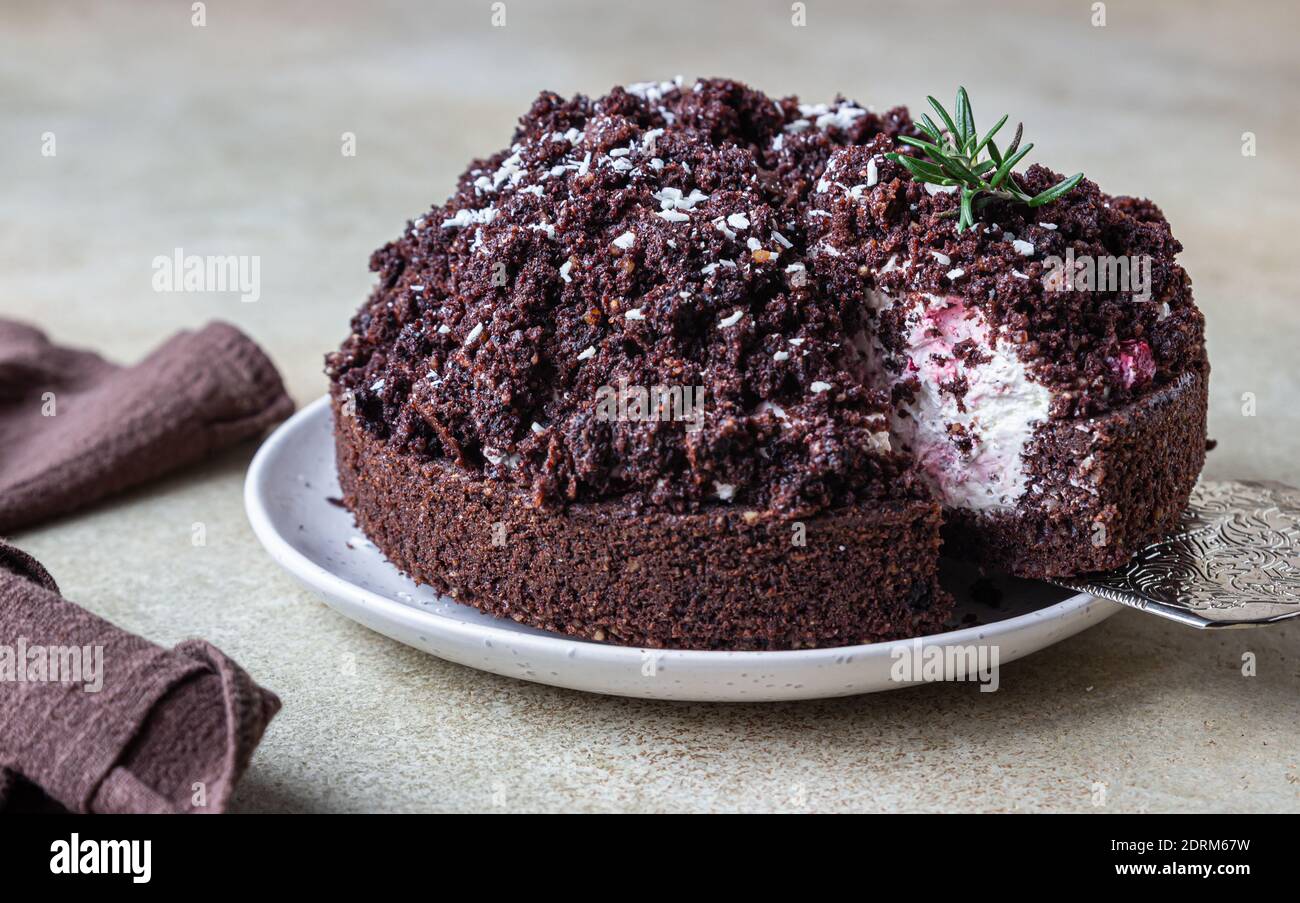 Homemade chocolate cake with cherry and whipped cream. Cake Mink mole ...