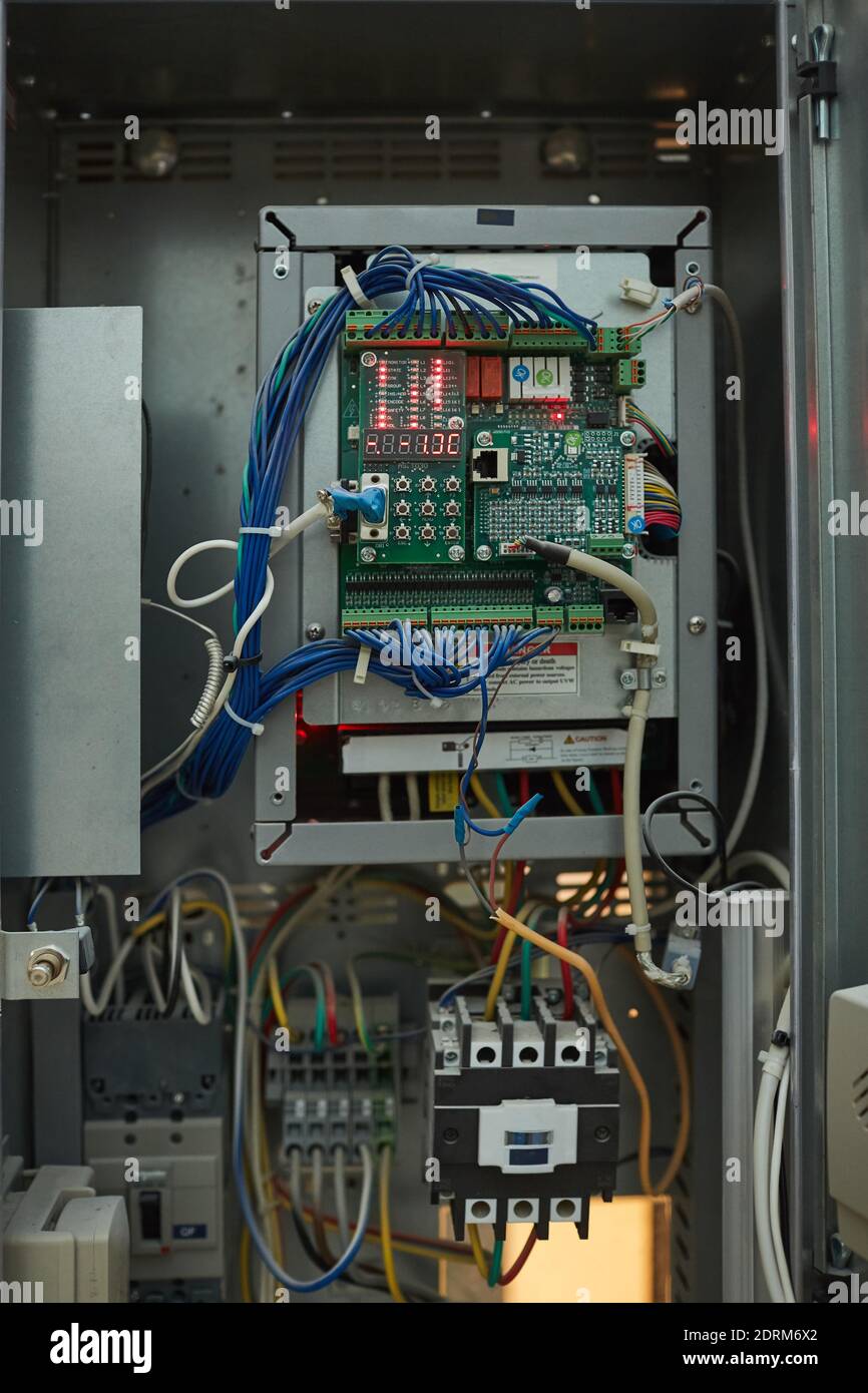 Background image of open electrical switchboard or security system ...