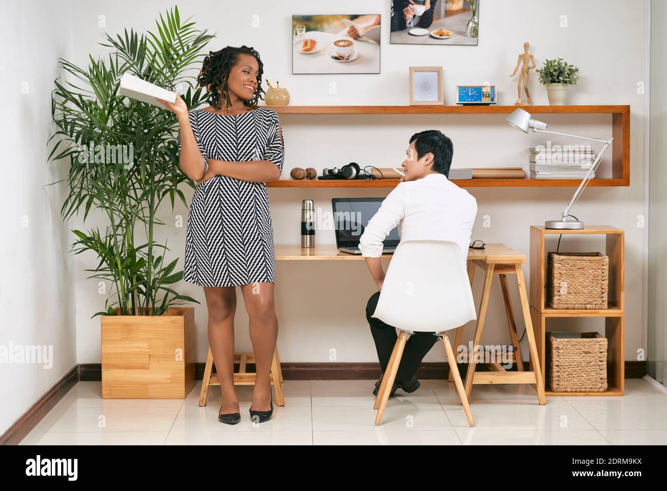 Managers working in office Stock Photo - Alamy