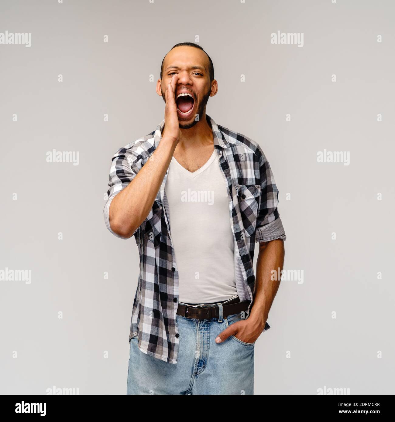 Shouting casual man standing hi-res stock photography and images - Alamy