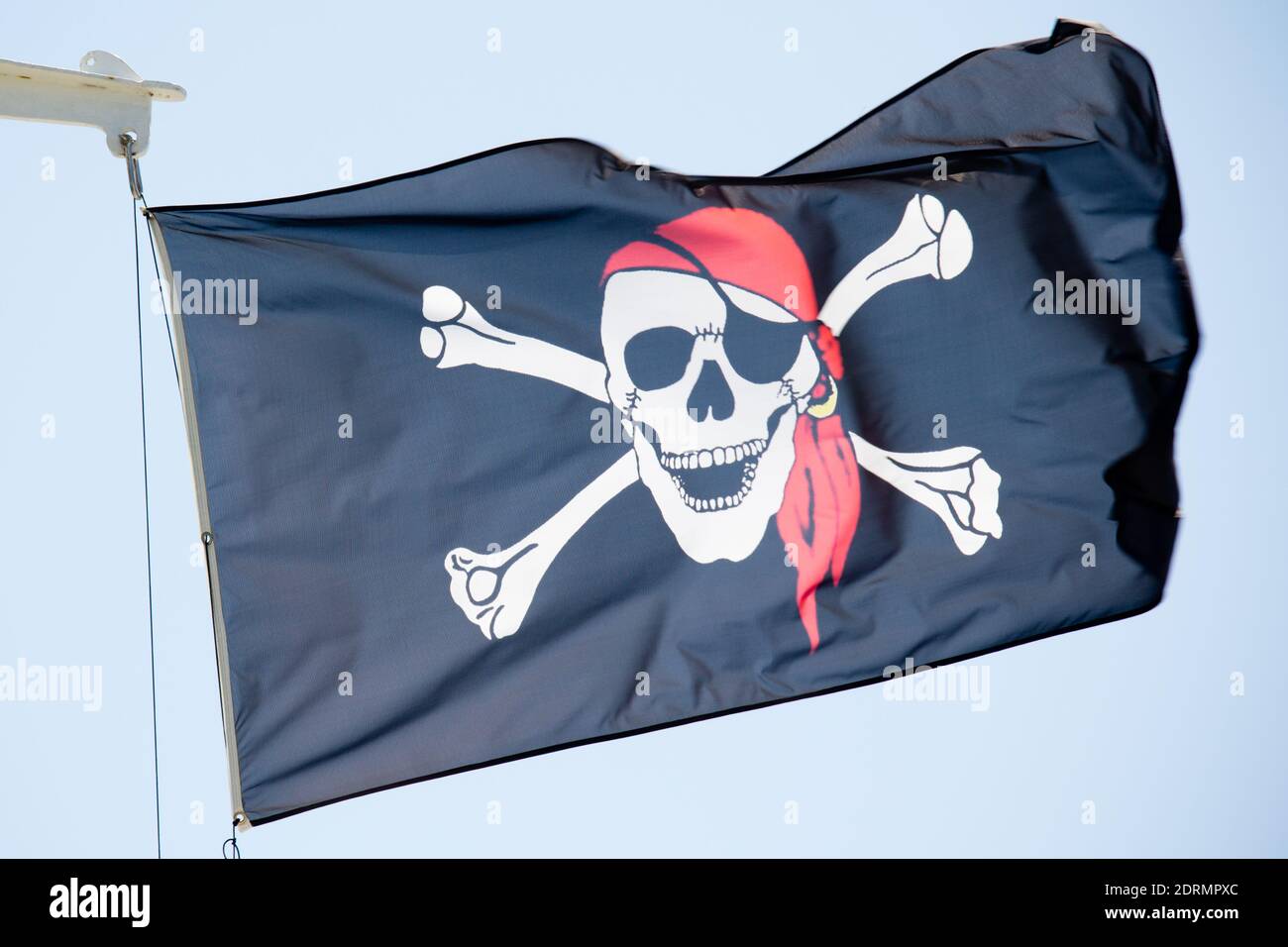 dark pirate flag in wind Stock Photo - Alamy