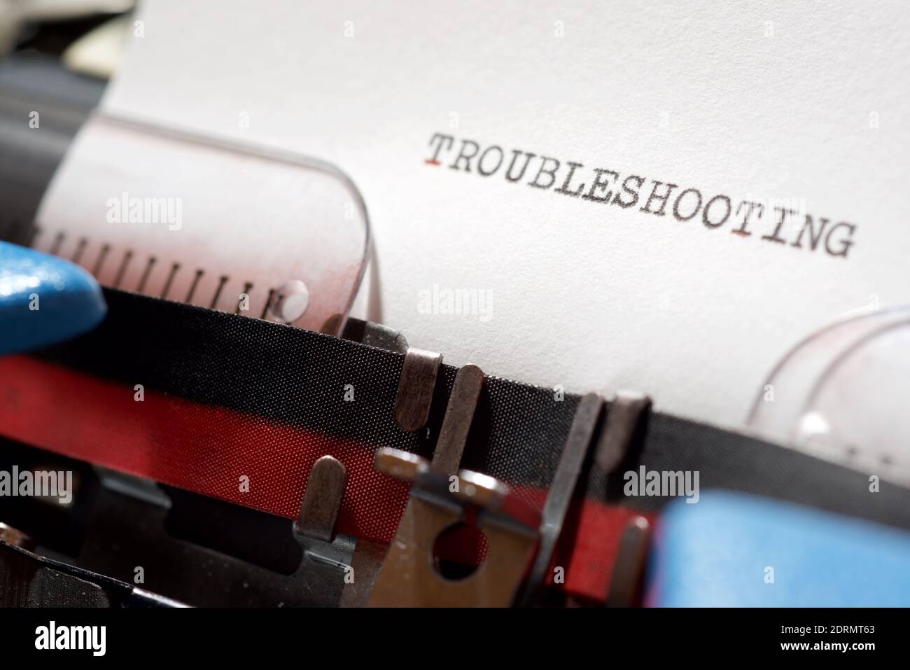Troubleshooting word written with a typewriter Stock Photo - Alamy