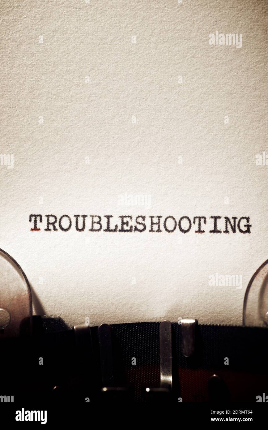 Troubleshooting word written with a typewriter Stock Photo - Alamy