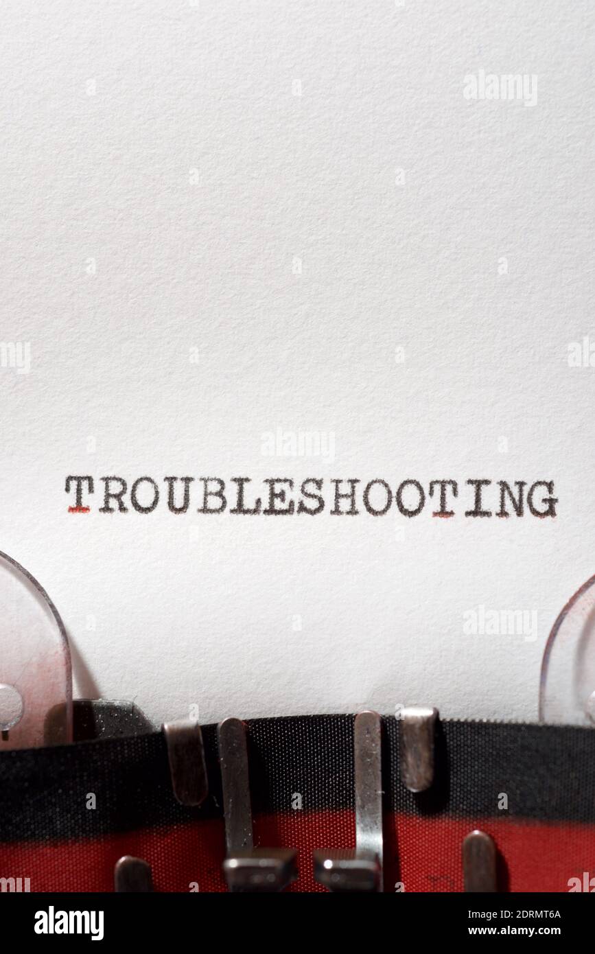 Troubleshooting word written with a typewriter Stock Photo - Alamy