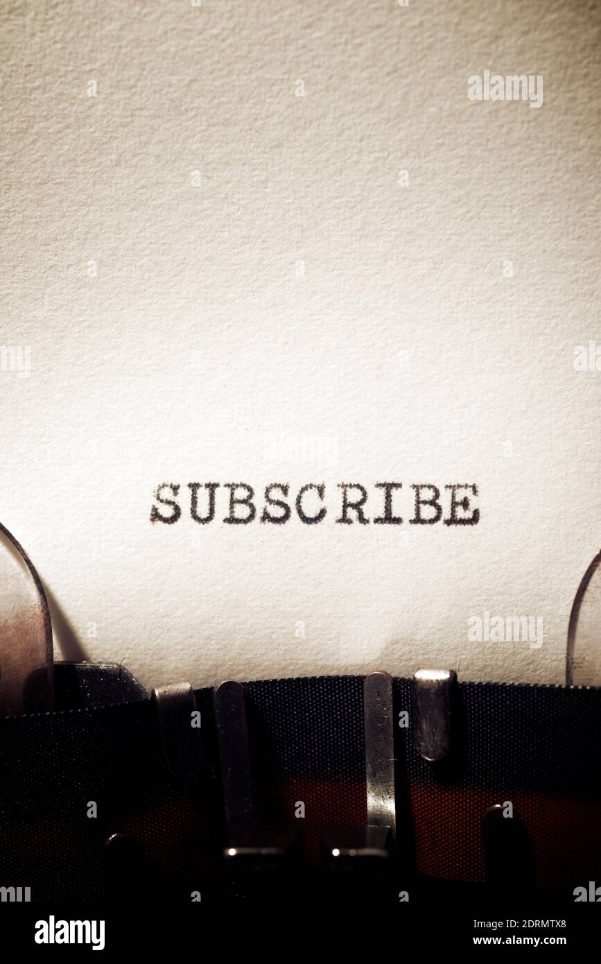 Subscribe word written with a typewriter Stock Photo - Alamy