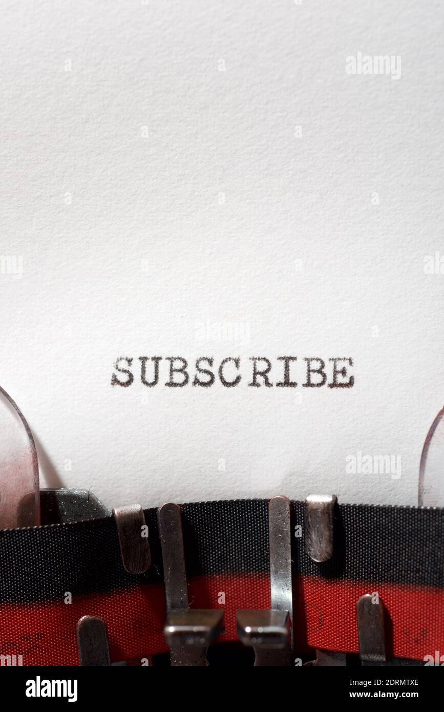 Subscribe word written with a typewriter Stock Photo - Alamy