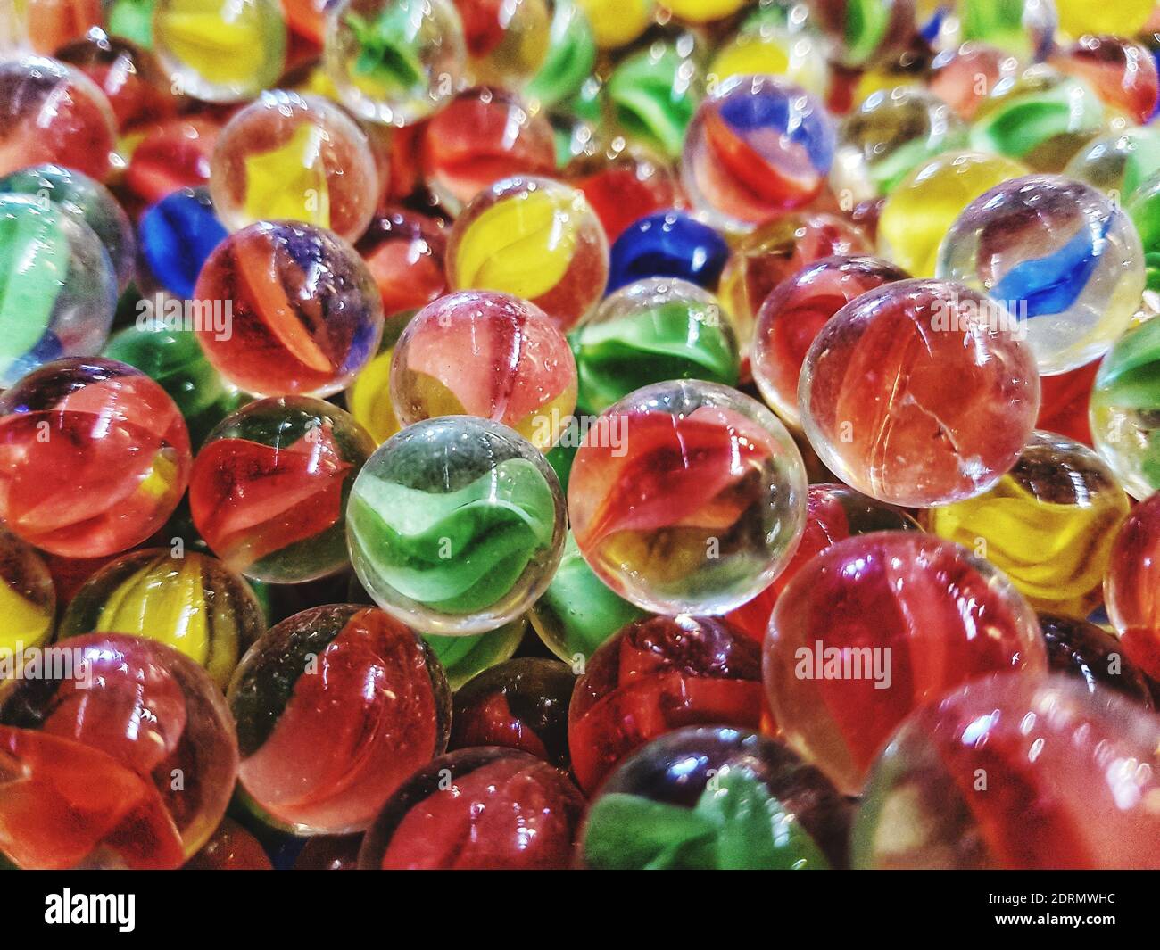 Glass full of marbles hi-res stock photography and images - Alamy