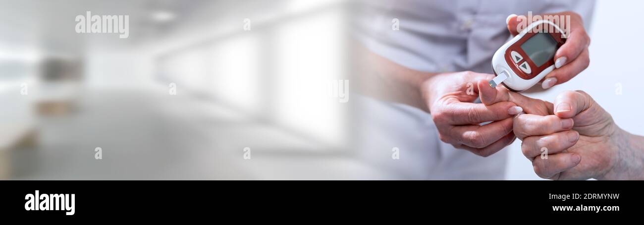 Nurse checking blood sugar level; panoramic banner Stock Photo - Alamy