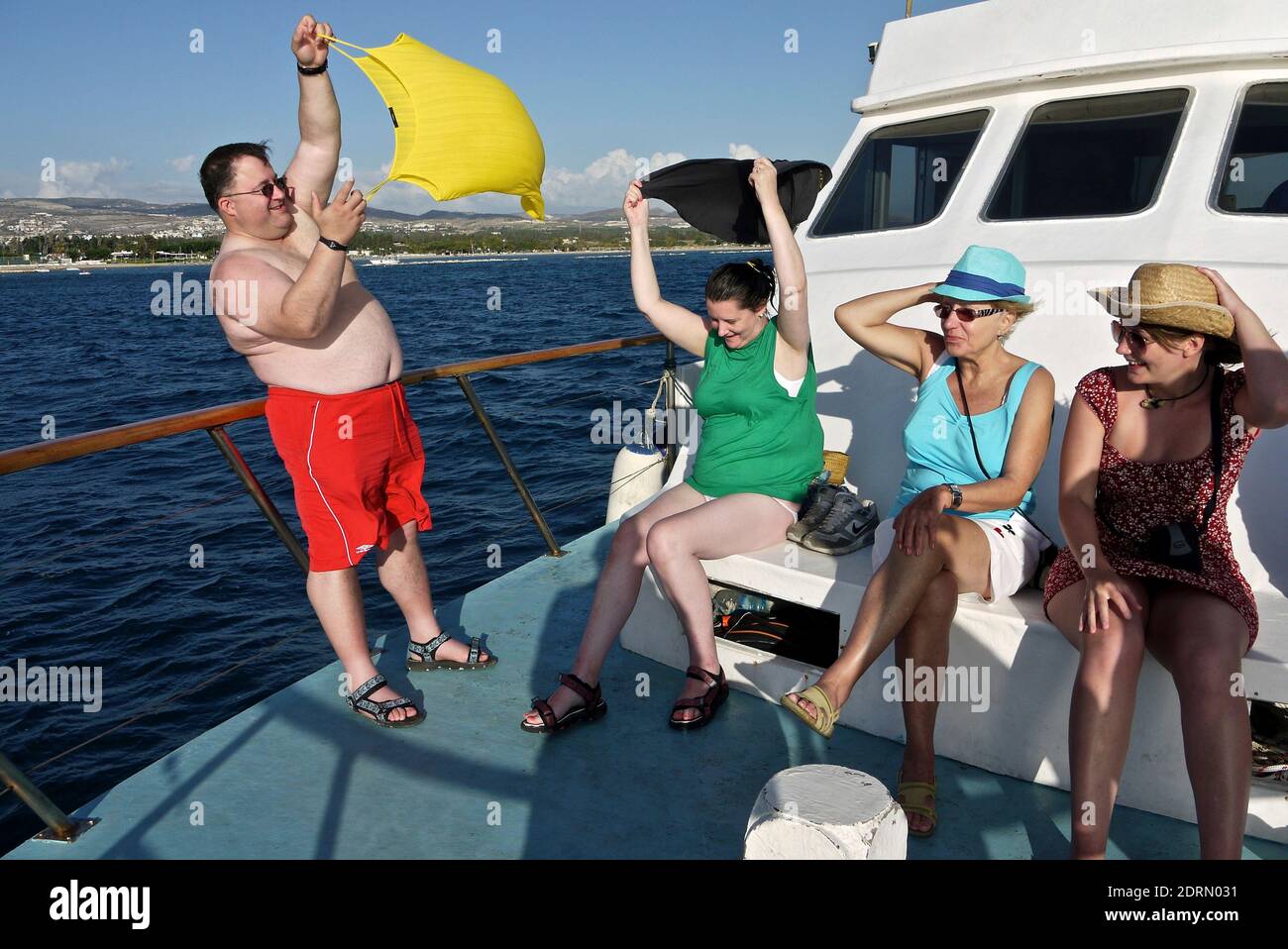 Tourists Drying Wet Clothes on Boat, Paphos, Cyprus Stock Photo - Alamy