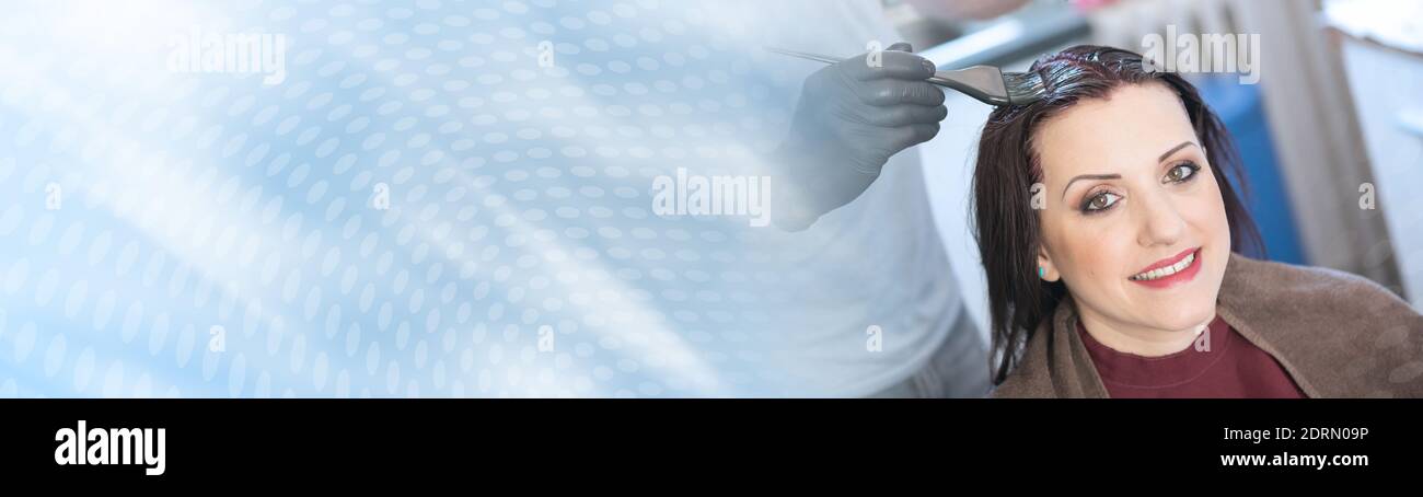 Hairdresser coloring client hair; panoramic banner Stock Photo - Alamy