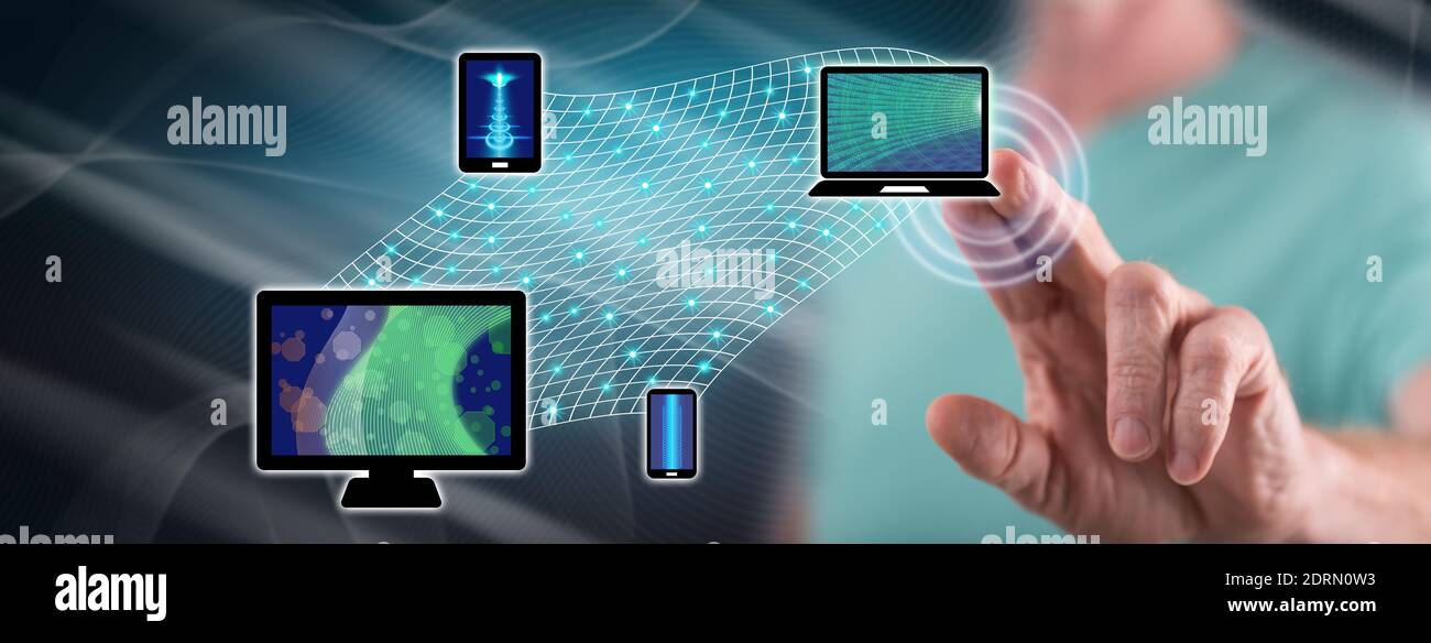 Man touching a device connection concept on a touch screen with his ...