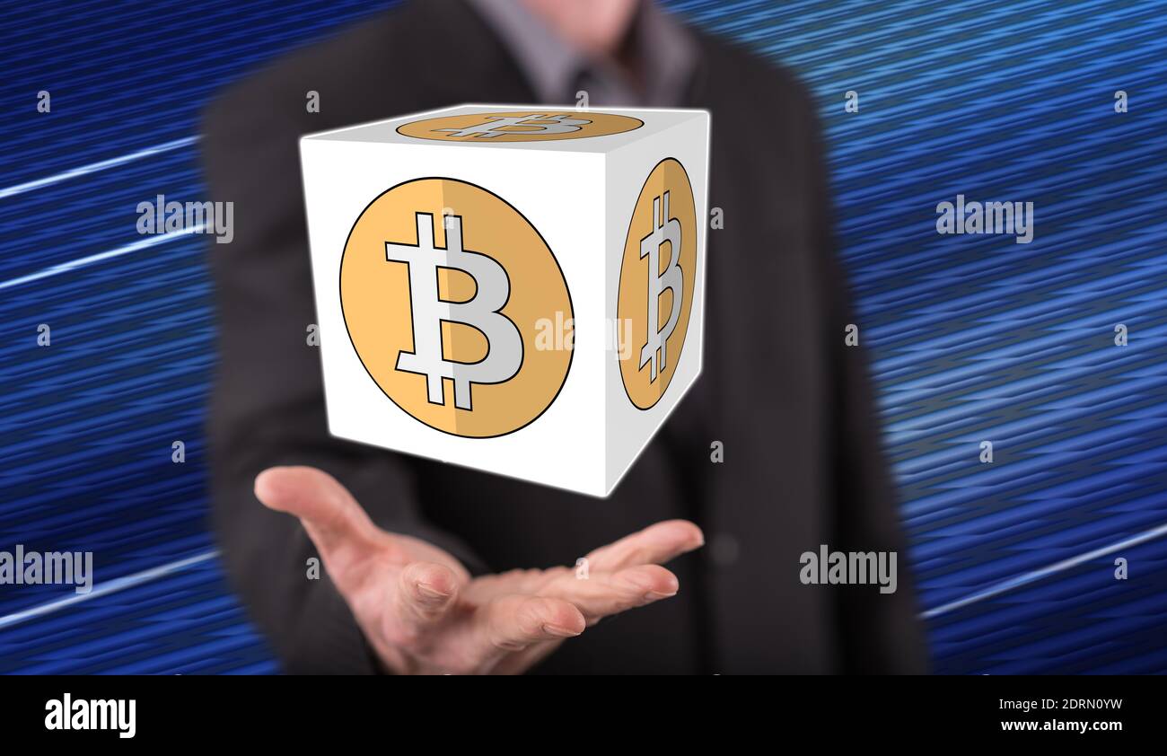 Bitcoin concept above the hand of a man in background Stock Photo - Alamy