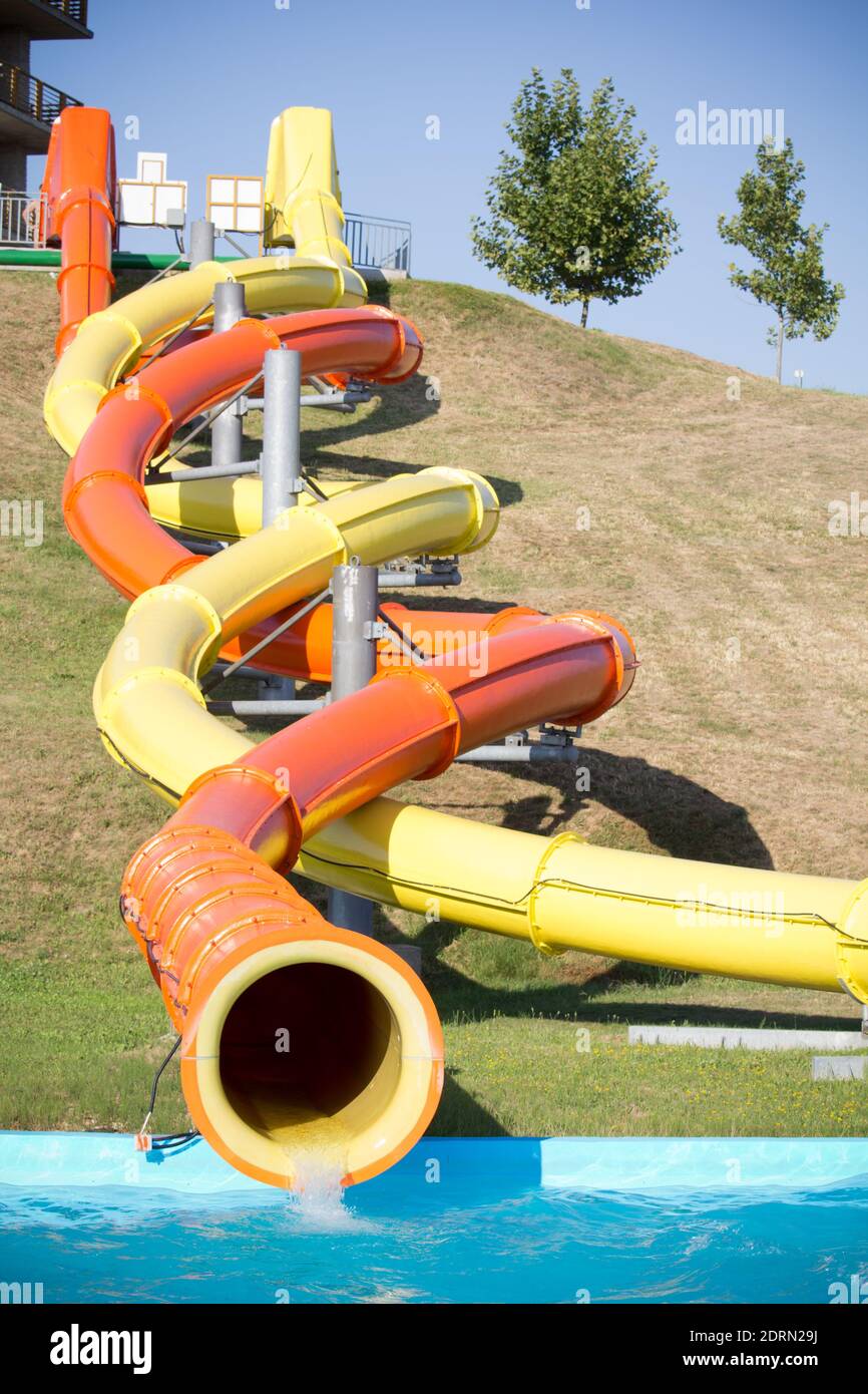 blue plastic waterslide in pool Stock Photo - Alamy