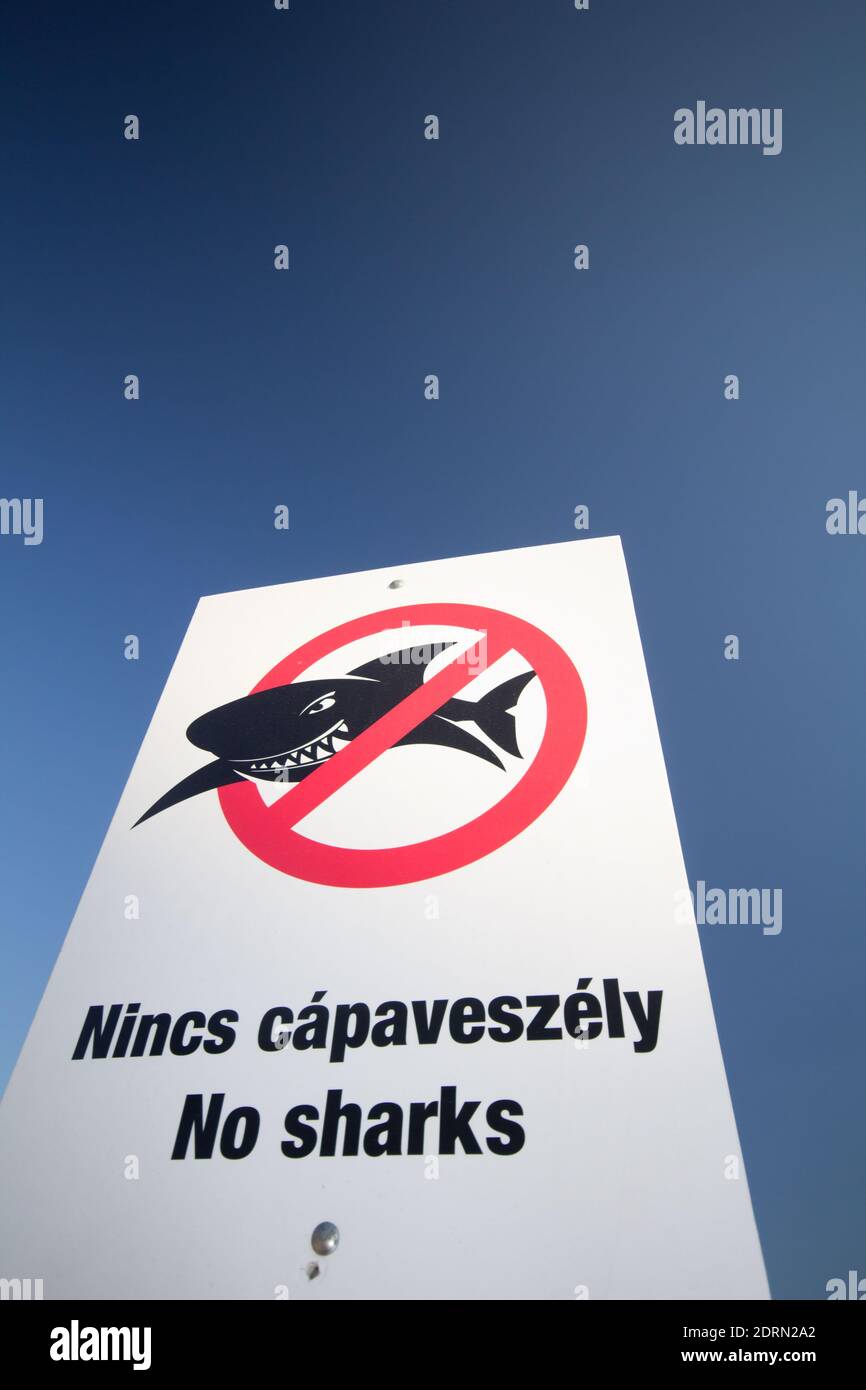No sharks sign in beach Stock Photo - Alamy