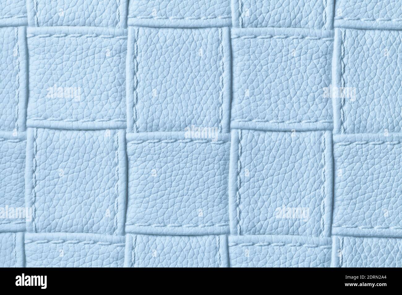 Texture of light blue leather background with square pattern and stitch ...