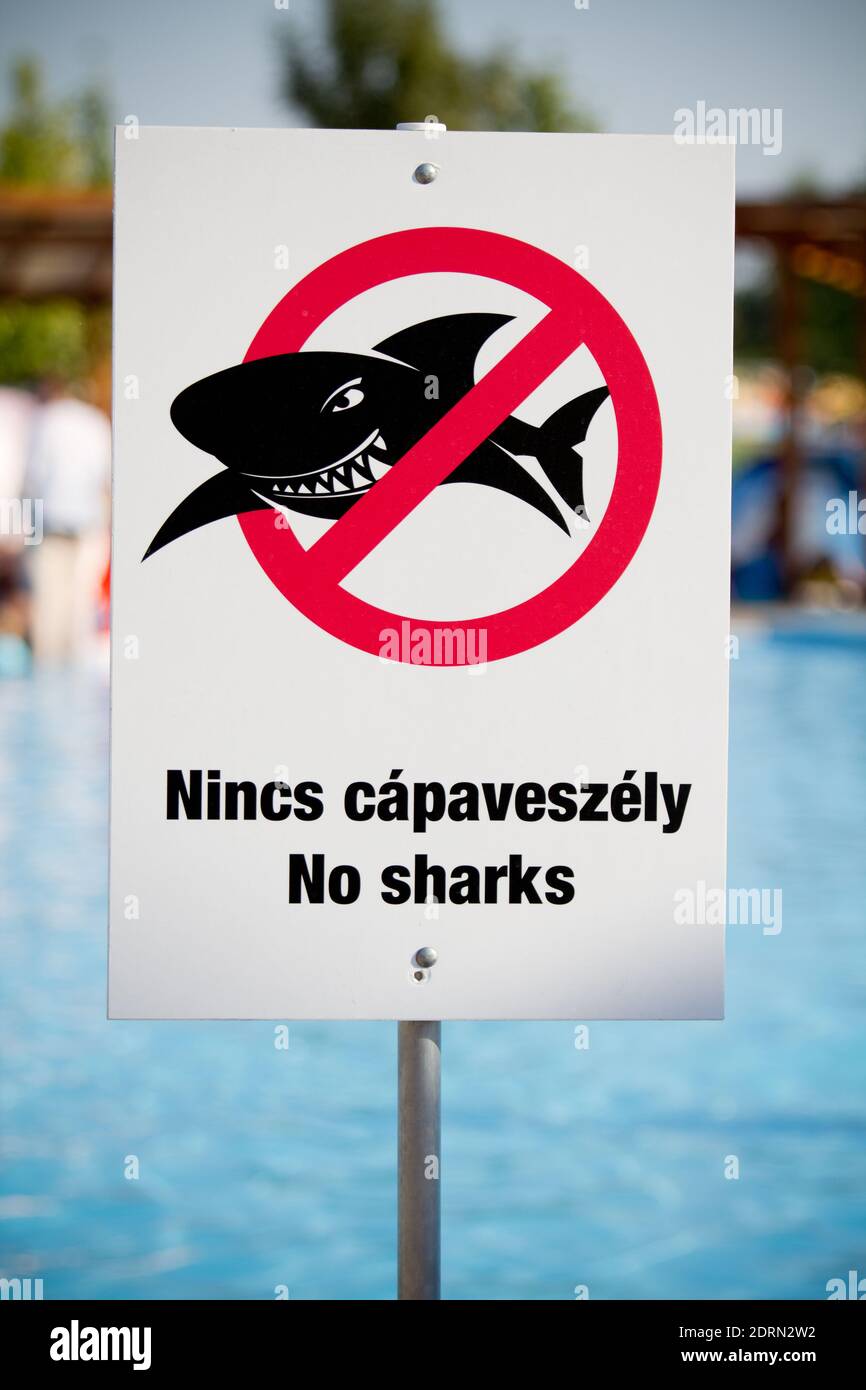 No sharks sign in beach Stock Photo - Alamy