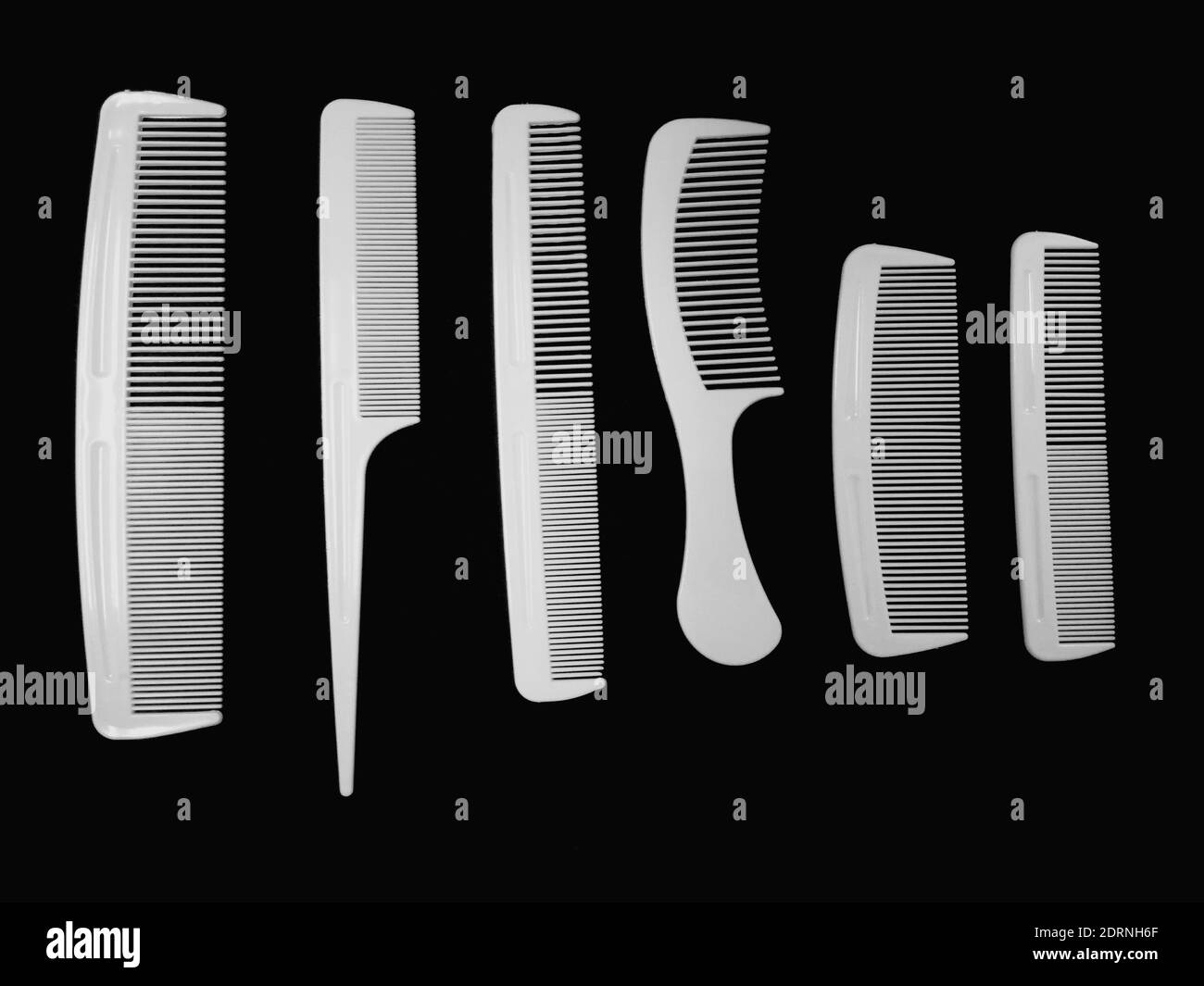 Arrangement of black combs hi-res stock photography and images - Alamy