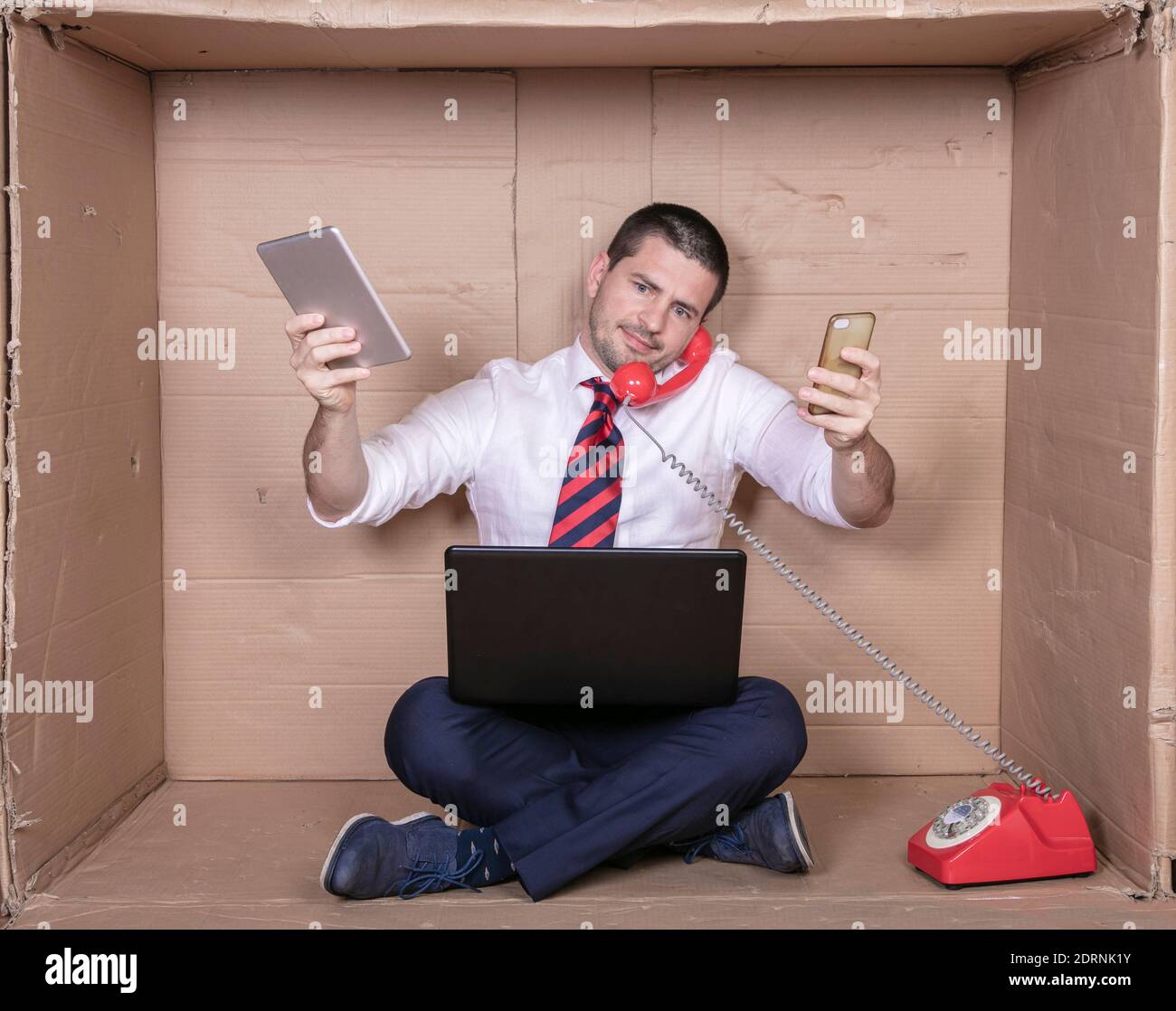 several tasks at once for one employee, hard work Stock Photo - Alamy