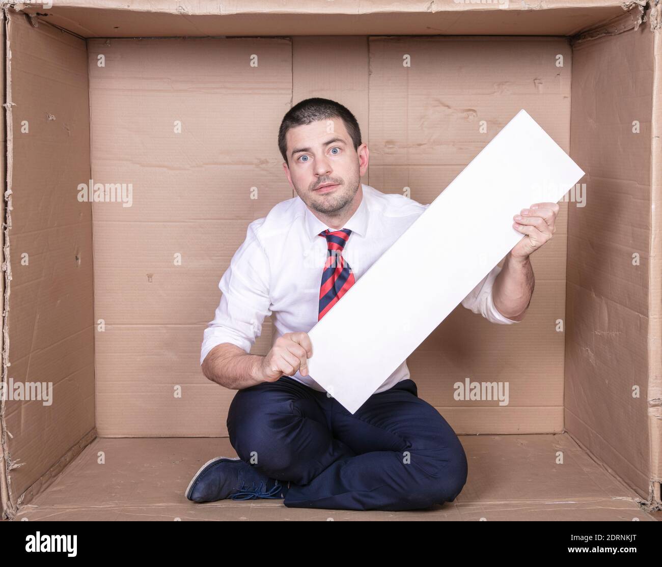 businessman in a cramped office with copy space in his hands Stock ...