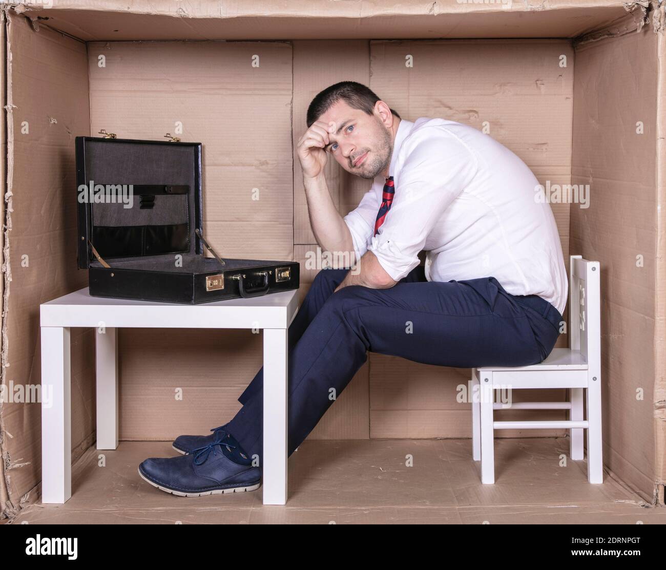 broken businessman was deceived, he received an empty briefcase Stock ...