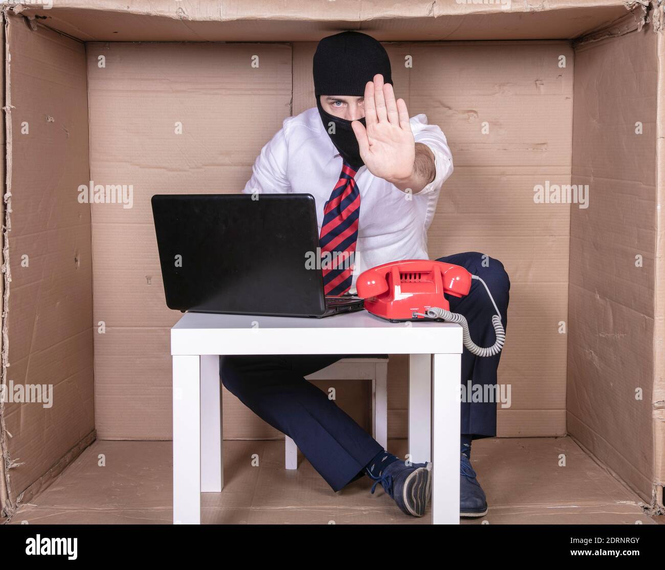 hacker shows stop sign with his hand, burglary warning Stock Photo - Alamy