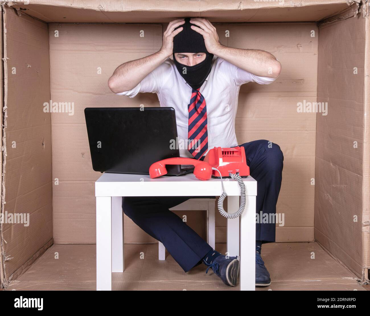 An undercover cop fighting with cybercrime grab his head Stock Photo ...
