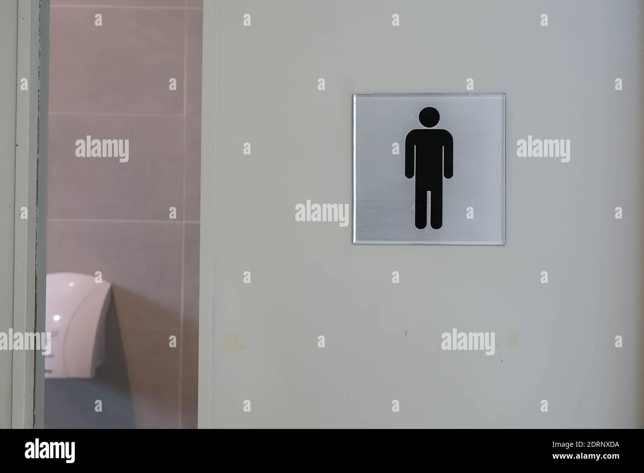 Close up of restroom sign on wall hi-res stock photography and images ...