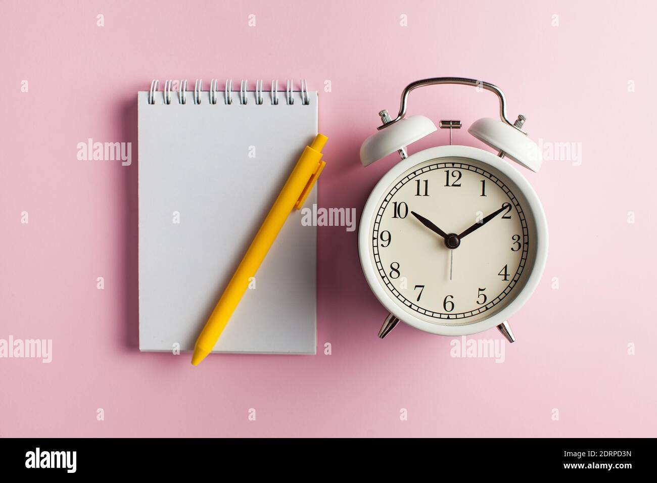 Notebook, pen, alarm clock. Blank card for to-do list, timetables, text ...
